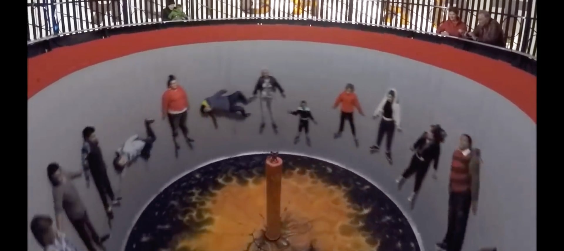 Why don't people fall out of roller coasters when they go upside down ...